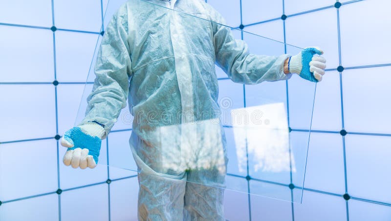 Laminated Thermal Insulation Glass in Worker Hand. Modern Smart Glass ...