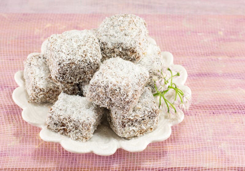Lamingtons on a plate stock image. Image of indulgence - 81354149