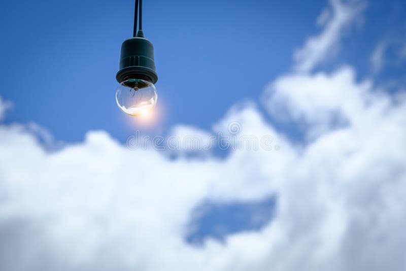 Lamp Bulb on a Sunny Day and Blue Sky Stock Image - Image of sunny ...