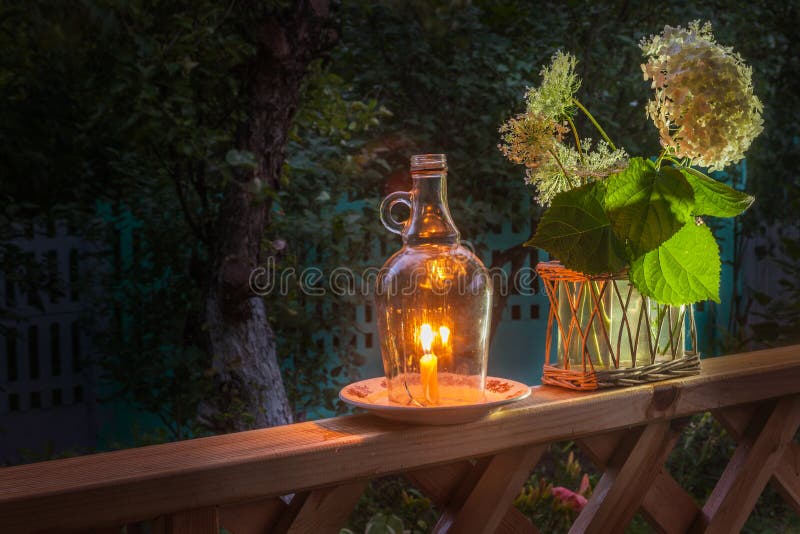 Lamp with a Candle on the Veranda at Night Stock Photo - Image of dusk ...