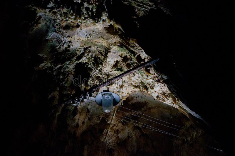 Lamp in cave stock photo. Image of black, little, filament - 61447248