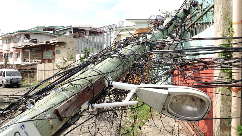 A Lamp and Fallen Utility Pole Editorial Photography - Image of ...