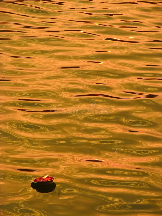 Lamp Floating on the Golden Water of River Ganges Stock Image - Image ...