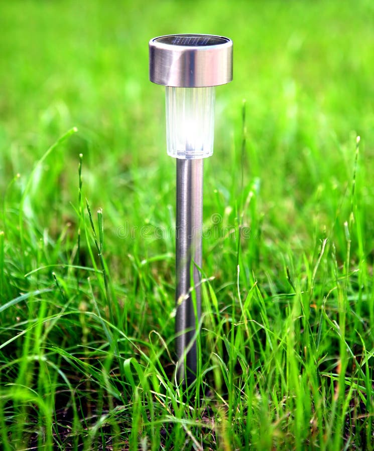 Led lamp on the grass stock image. Image of friendly - 22360759