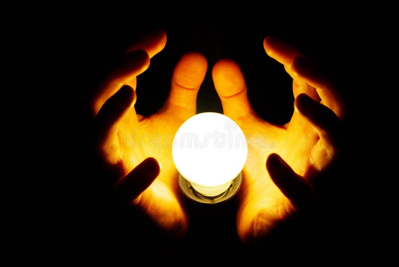 Lamp in hand stock photo. Image of imagination, electric - 7737432