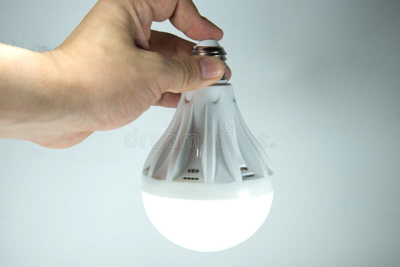 Lamp in hand stock photo. Image of closeup, isolated - 82244920