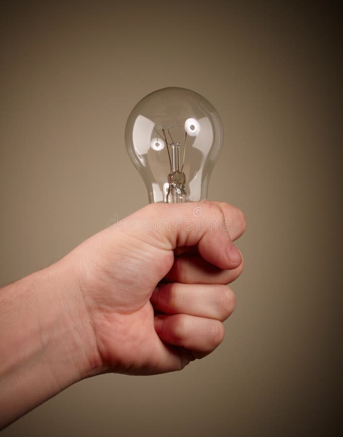 Lamp in hands stock image. Image of creativity, protect - 13405391