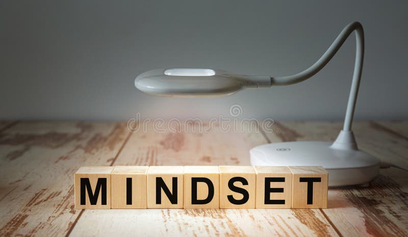 Lamp Illuminates Wooden Blocks with the Word MINDSET Stock Photo ...