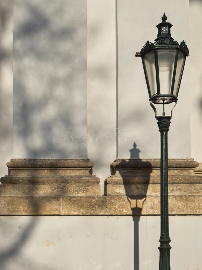 A Lamp and Its Shadow by the Wall by the Wall of the Church Stock Image ...