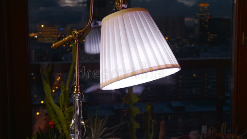 The Lamp in the Living Room in Front of Window. Creative. Lamp on the ...