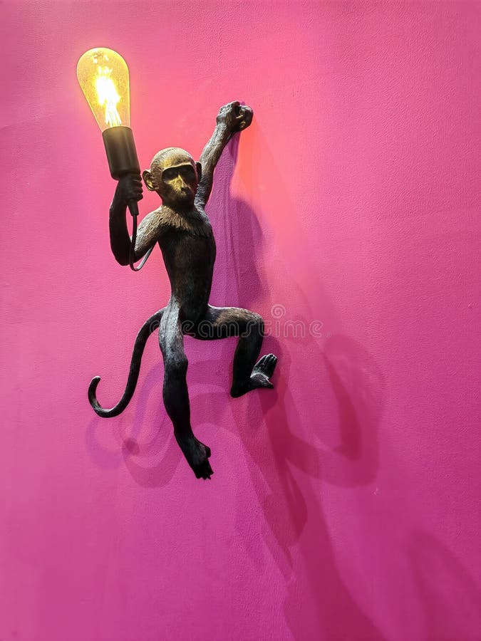 Lamp of a Monkey in a Interior Pink Wall Decoration Stock Photo - Image ...