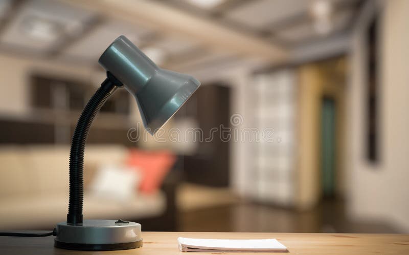 Lamp and notebook on table stock photo. Image of vintage - 207921378