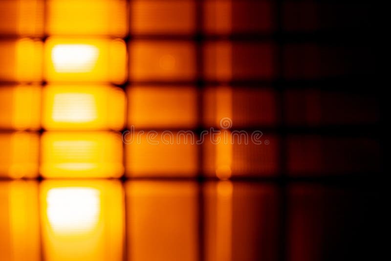 Lamp of Orange Light in the Elevator. through the Bars Stock Photo ...