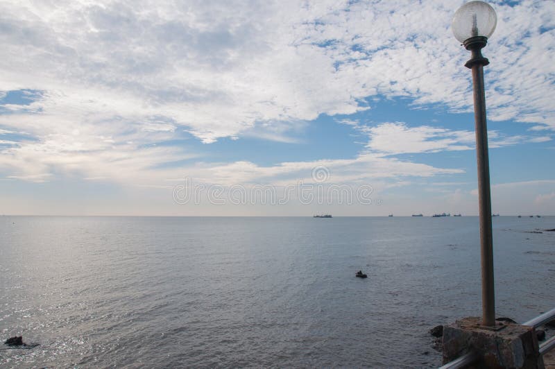 Lamp pole and the beach stock image. Image of illuminated - 61940633