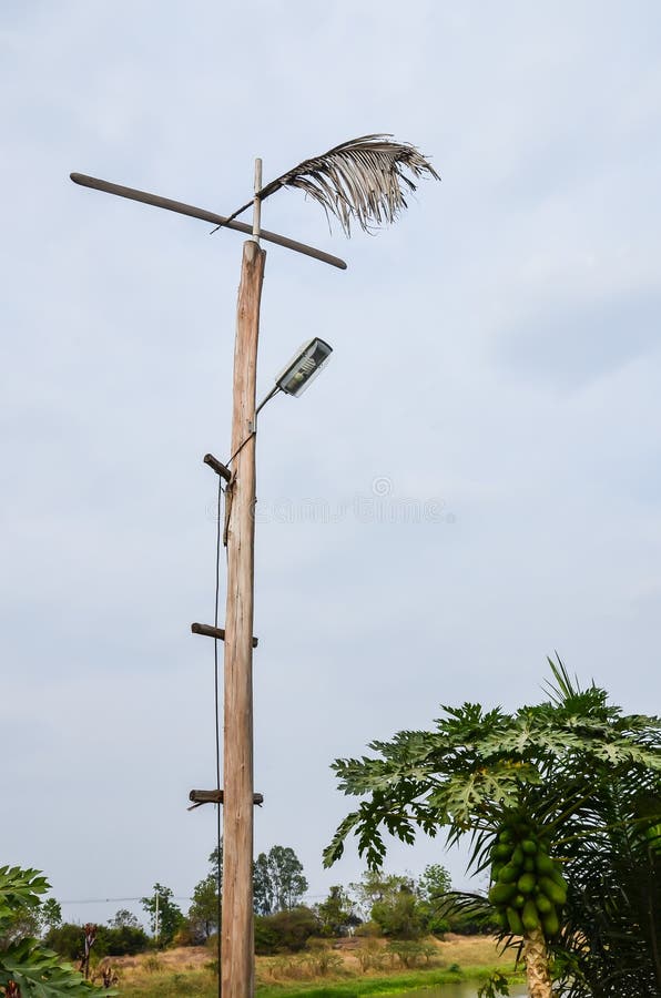 Lamp pole wood stock photo. Image of equipment, light - 152325596