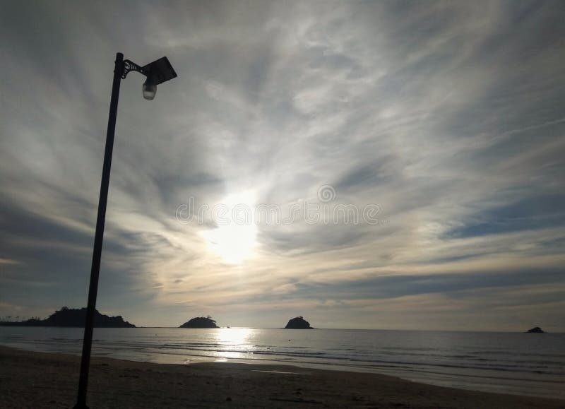 A lamp post on a beach. stock image. Image of sunlight - 188306771