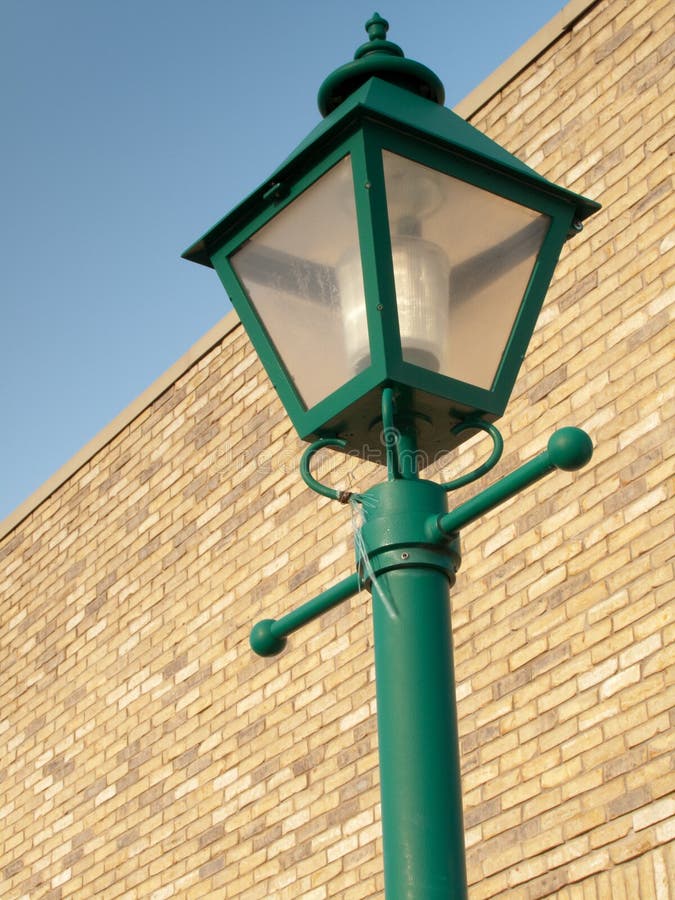 Lamp Post on brick stock image. Image of painted, brick - 9673679