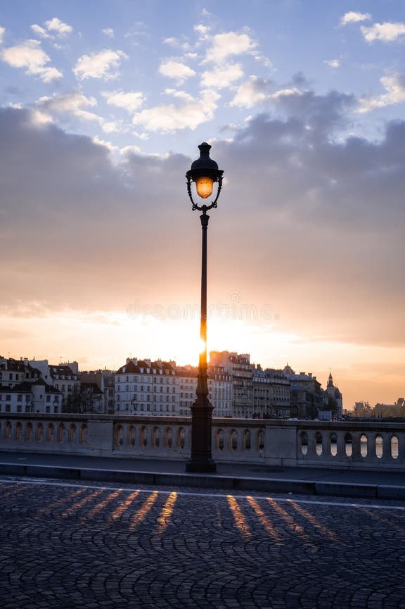 Lamp Post on a Bridge in Paris at Sunset Stock Photo - Image of urban ...