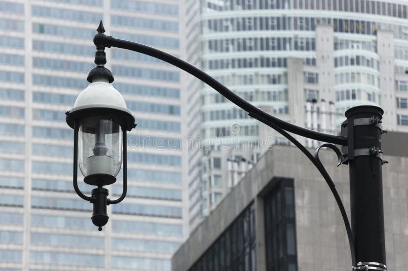 Lamp-post with City Background Stock Image - Image of wall, landscaped ...