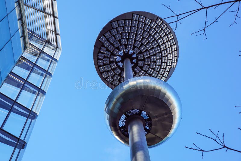 Lamp Post in Front of a Glass and Concrete Facade on a Modern Corporate ...