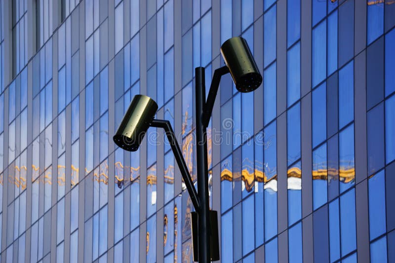 A Lamp Post in Front of a Modern Building Stock Image - Image of steel ...