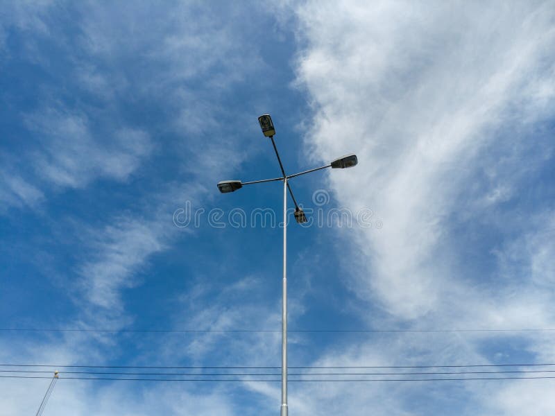 Lamp post stock photo. Image of white, electric, cloud - 229835276