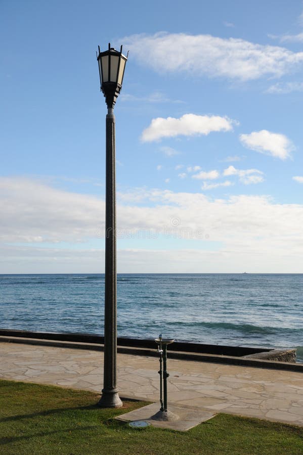 Lamp post by ocean stock image. Image of shore, cloudscape - 5559177