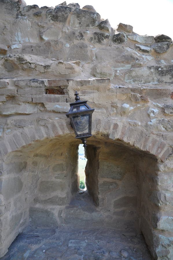 Lamp post on old wall stock image. Image of beautiful - 103264103