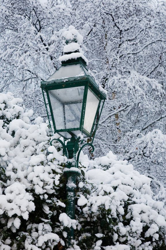 A lamp post in the snow stock image. Image of white, cold - 12557239
