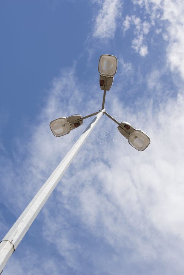 Lamp Post with Three Lights Against a Blue Sky. Stock Image - Image of ...