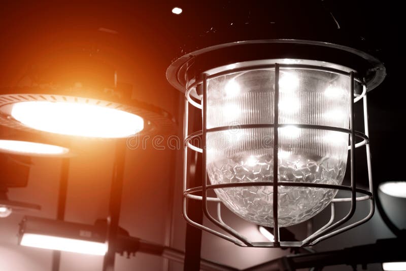 Lamp in a Protective Metal Frame Stock Photo - Image of glass, framing ...