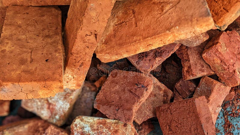 An Irregular Pile of Red Bricks Stock Photo - Image of shape, pile ...