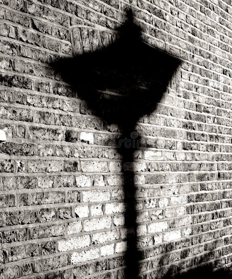 Lamp Shadow stock photo. Image of town, lamp, brick, street - 653860