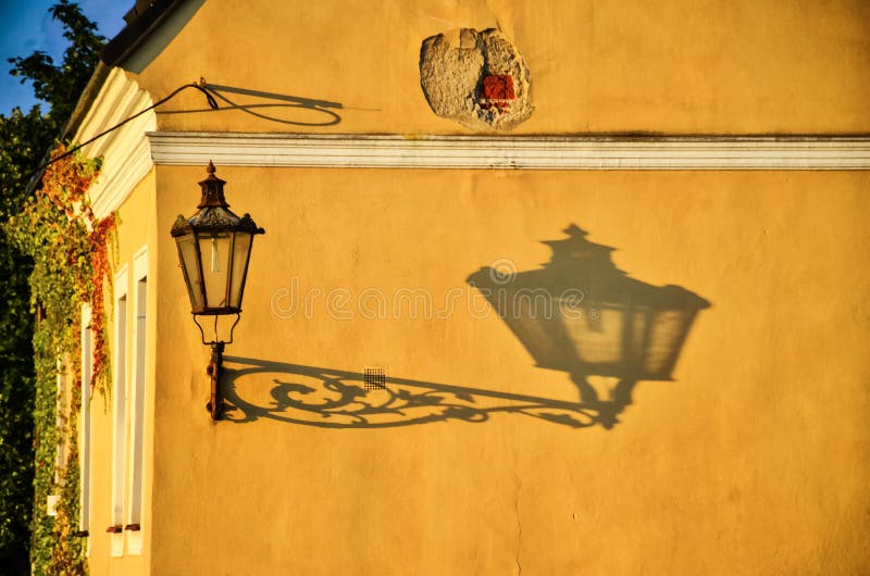 Lamp and Shadow on the Wall of Old Yellow House Stock Photo - Image of ...