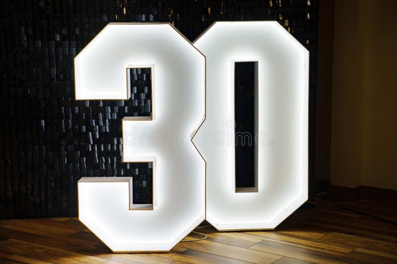 The Lamp in the Shape of the Number 30 Strip Against the Background of ...