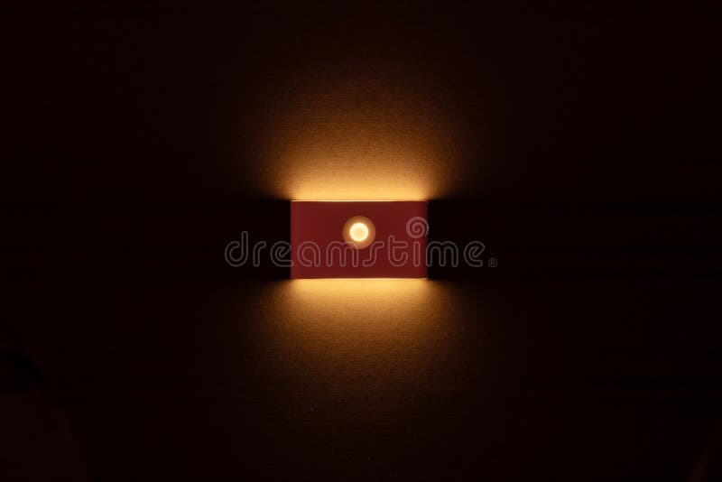 The Lamp Shines with Warm Light on the Wall. Warm Lighting Stock Image ...