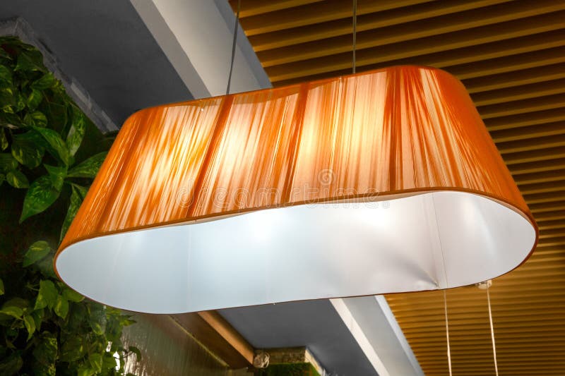 Lamp with Soft Light Suspended from the Ceiling. Interior of Cozy ...
