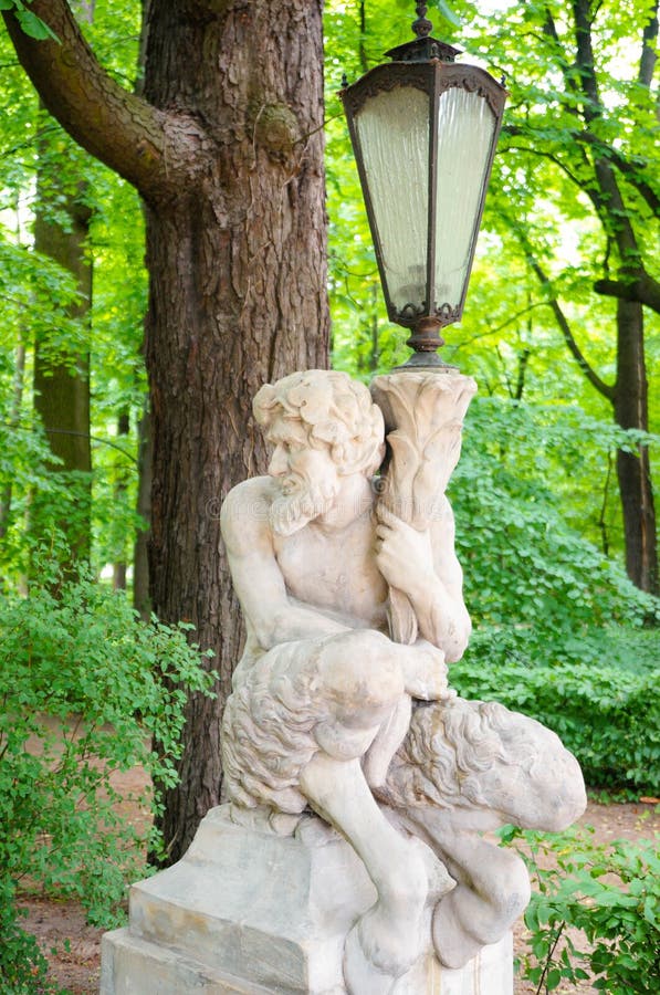 Lamp statue stock photo. Image of holding, trees, park - 55528412
