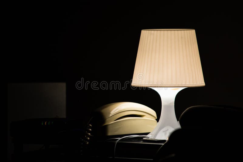 Lamp and Telephone in a Dark Hotel Room Stock Image - Image of dark ...