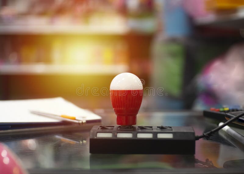The Lamp is Turned on a Light Orange Burst Stock Photo - Image of black ...