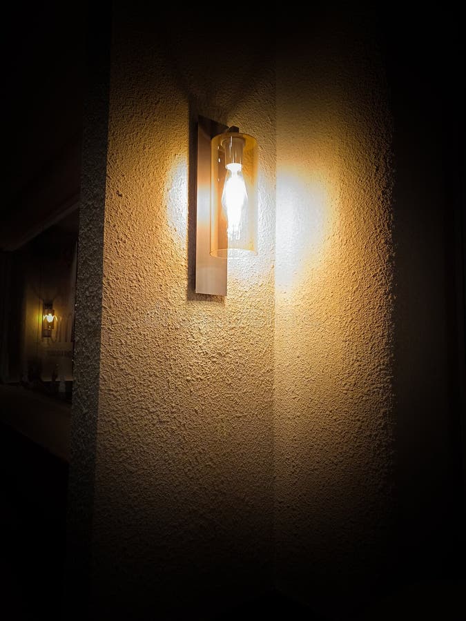 The Lamp on the Wall in the Dark Emitted a Beautiful Sparkling Light ...