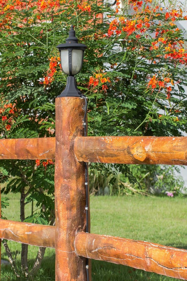 Lamp wall on fence brick stock image. Image of lamppost - 75994467