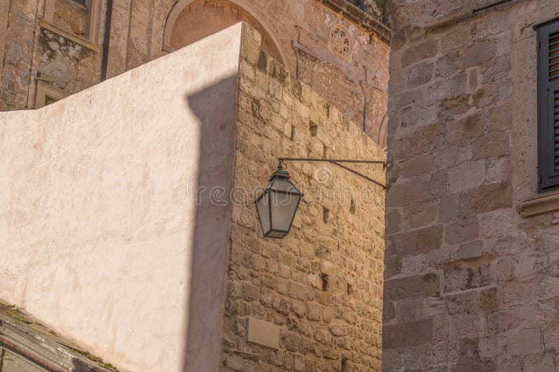 Lamp on the Wall of Medieval Town Stock Image - Image of romanesque ...