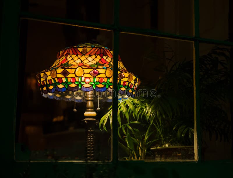 Lamp in window at Night stock photo. Image of night, stained - 37453702