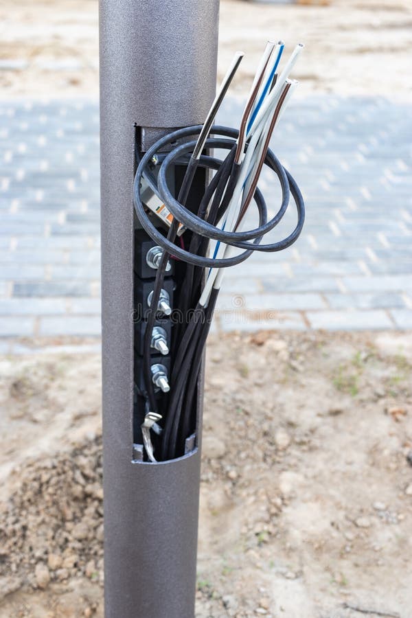 Lamppost with Open Hole. Inside is a Power Switch and Electrical Cables ...