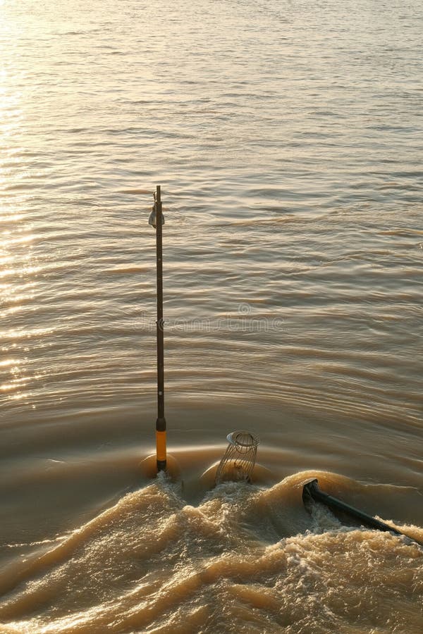 Lamppost Partially Submerged in the Sea Stock Photo - Image of ...