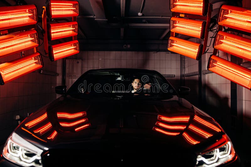 Lamps for Drying the Ceramic Coating are Behind Car Stock Photo - Image ...
