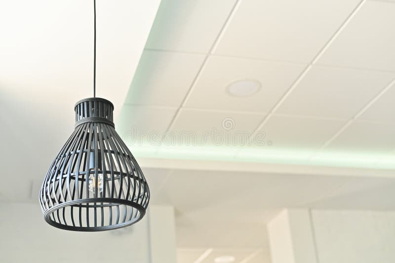 Lamps on Long Wires in Front in a Bright Interior, Elements of Lighting ...