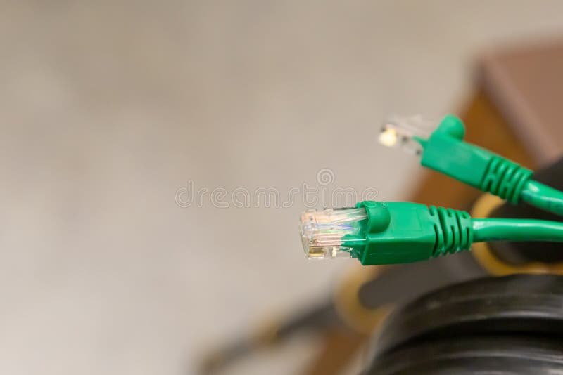 LAN Cable Internet End of Connector with Copy Space Closeup on Blurred ...