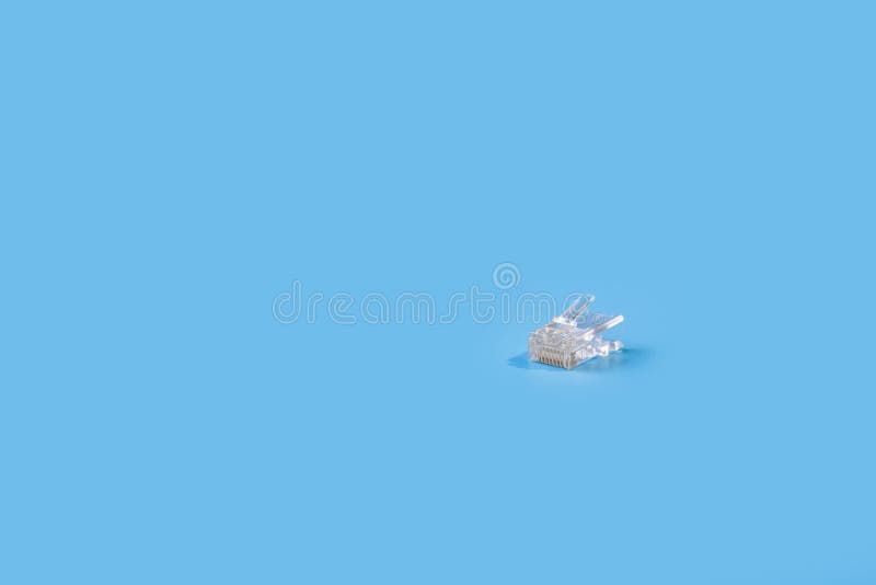 A Lan Connector Close Up Isolated in Blue Background. Copy Space Stock ...